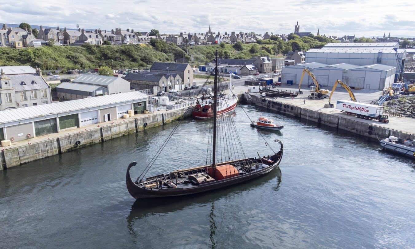 Drone shows Viking boat arrive in Buckie before Odyssey filming