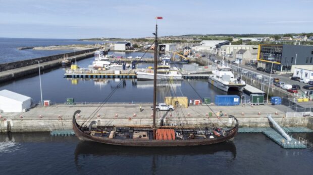 Drone shows Viking boat arrive in Buckie before Odyssey filming