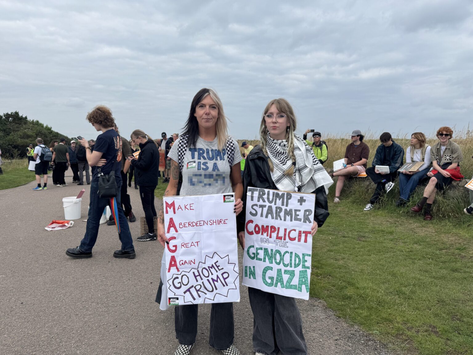 'Disgusted' protestors rally near Donald Trump's north-east course