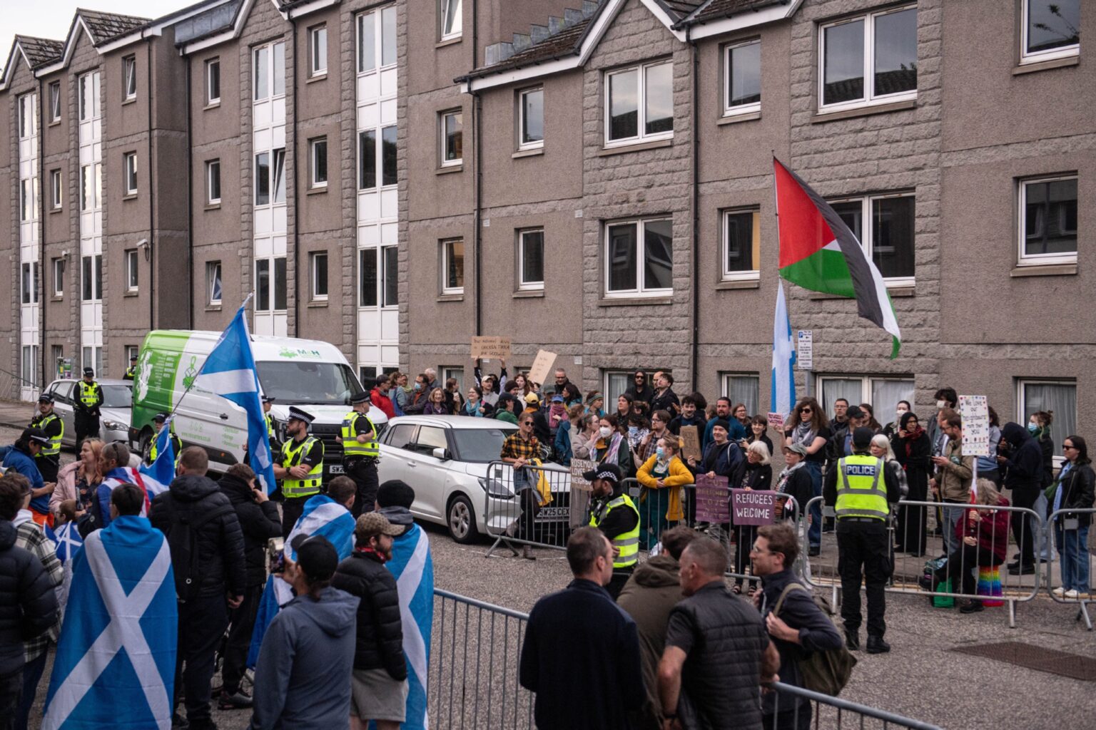 Anti-immigration and counter protestors clash at Farmers Hall