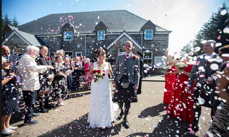 Firefighters Kara and Andrew Mackay get married with a fire engine