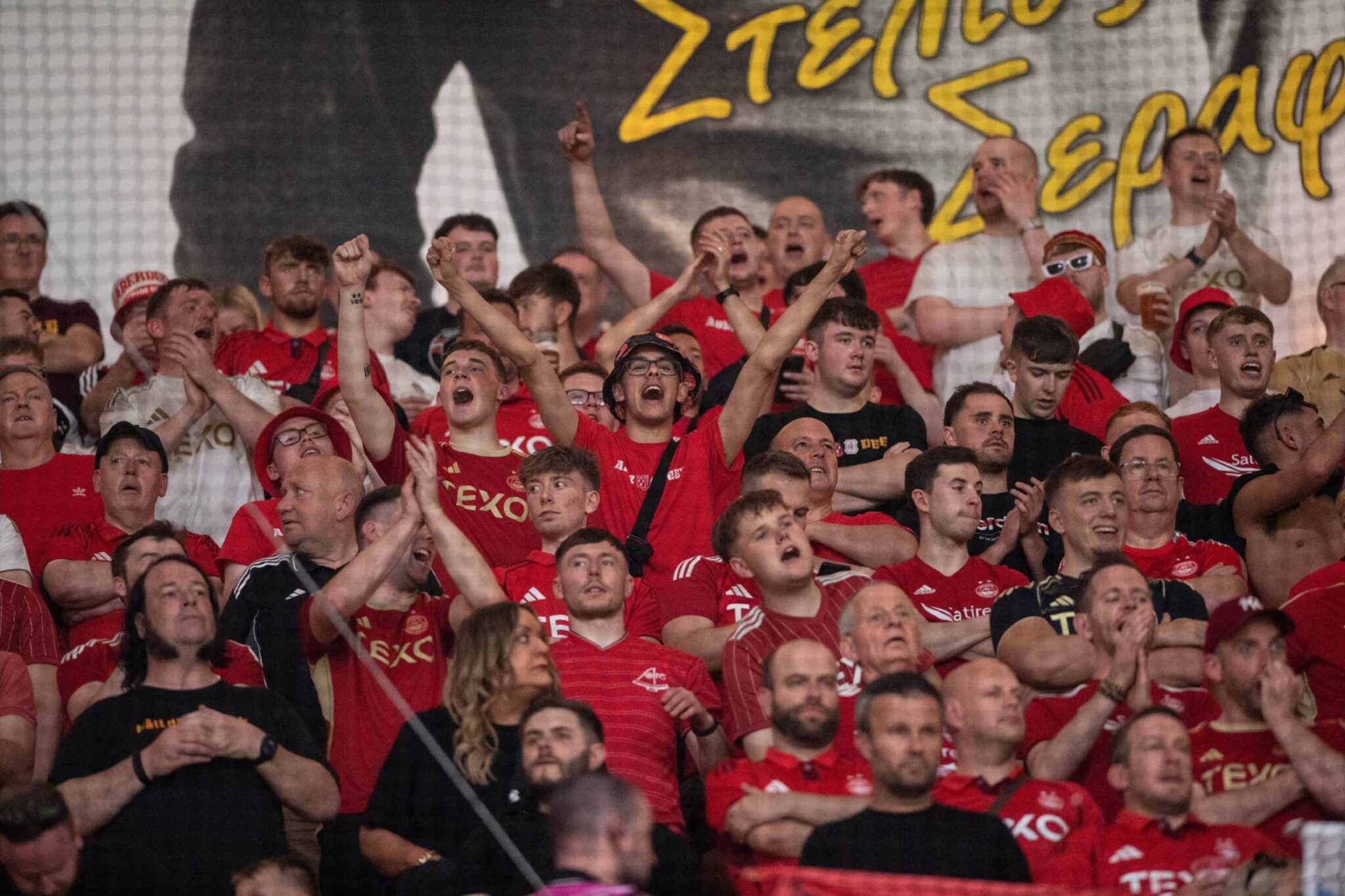 Aberdeen FC fans face riot police in Athens stadium