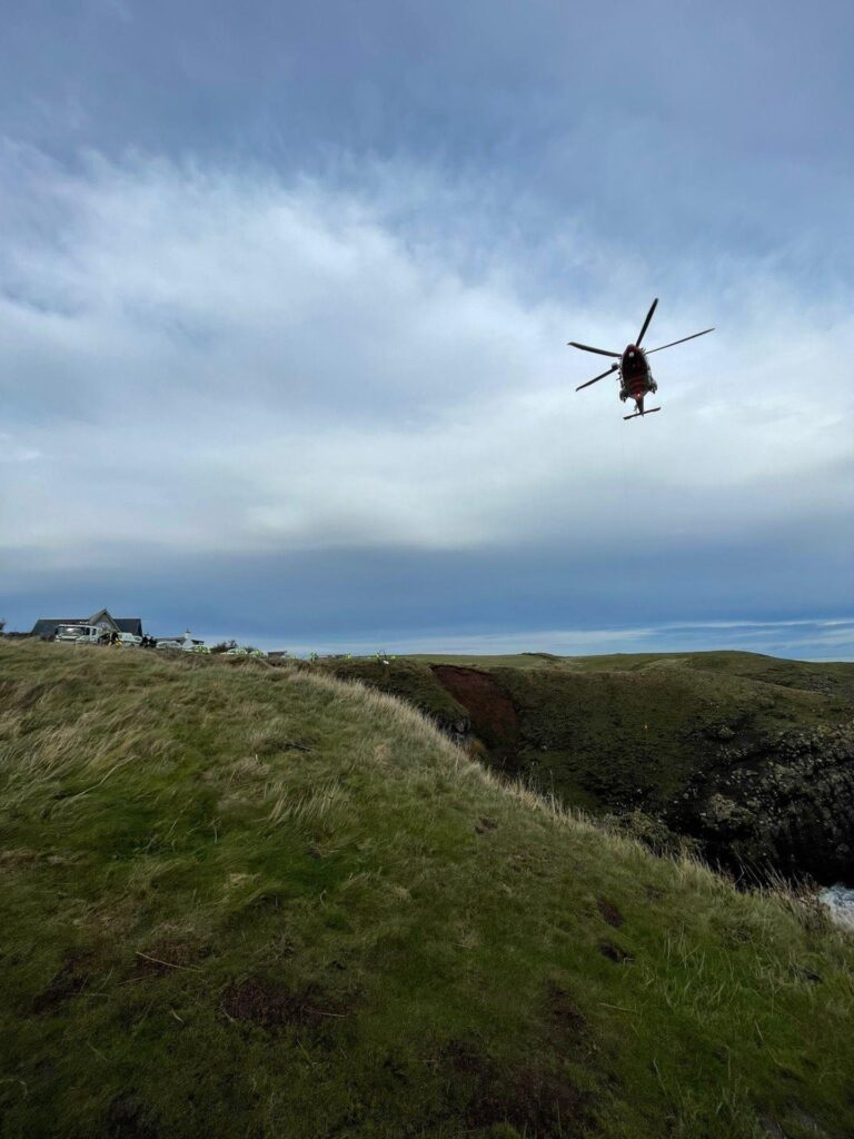 Major rescue effort after car plunges over cliff near Crawton