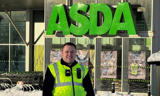 Asda Huntly worker and retained firefighter rescues trapped driver