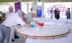 Harry Gow 'breaks record for world's biggest empire biscuit'