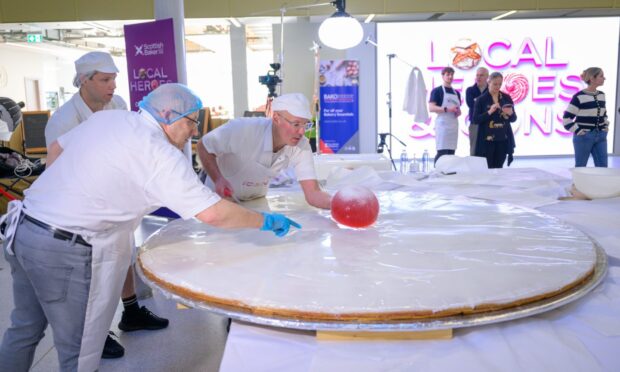 Harry Gow 'breaks record for world's biggest empire biscuit'