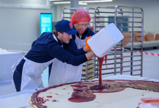 Harry Gow 'breaks record for world's biggest empire biscuit'