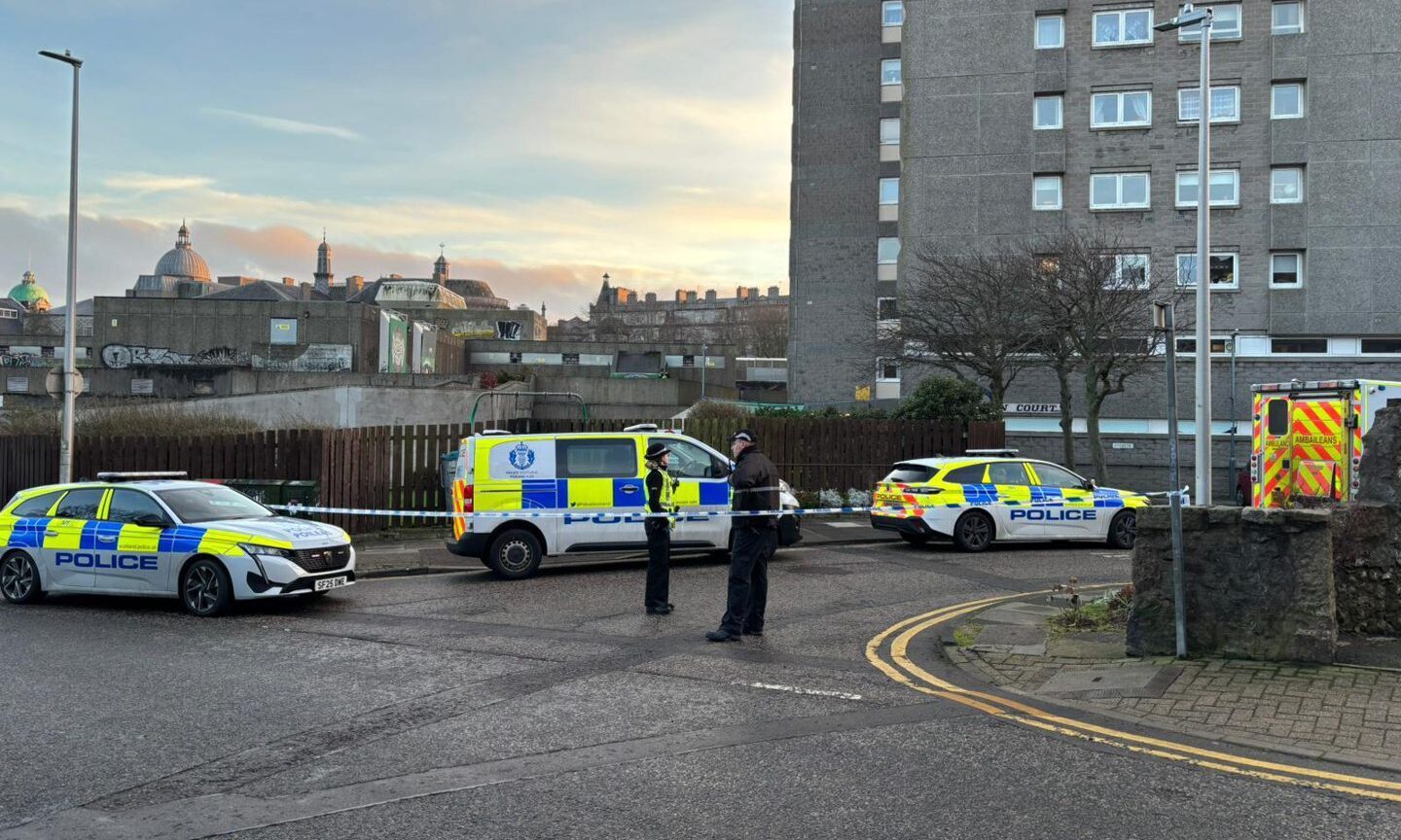 Man dies after being found 'unresponsive' outside Aberdeen flats