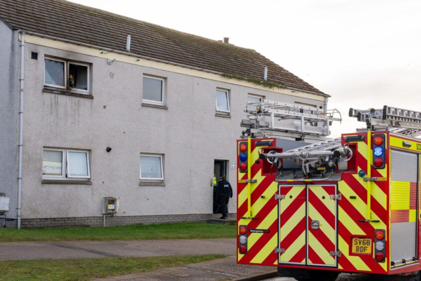 Firefighters called to Elgin flat fire