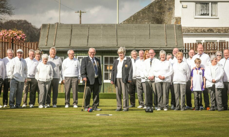 Members honoured as Longforgan opens centenary bowling season - The Courier